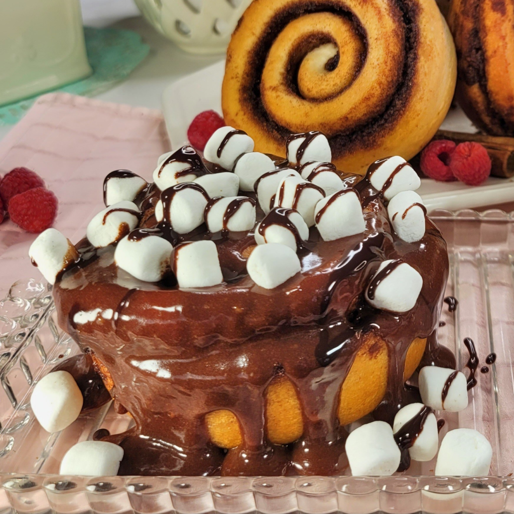 Hot Cocoa Cream Cinnamon Roll - Cinnamom Bakery