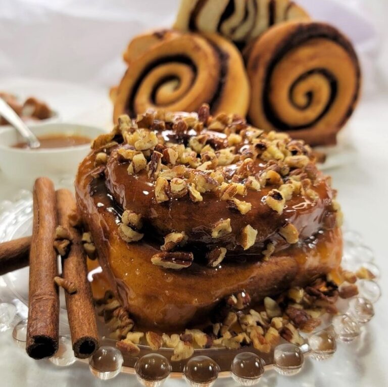 CinnAmazing Tea Ring with Traditional Glaze and Pecans - Cinnamom Bakery