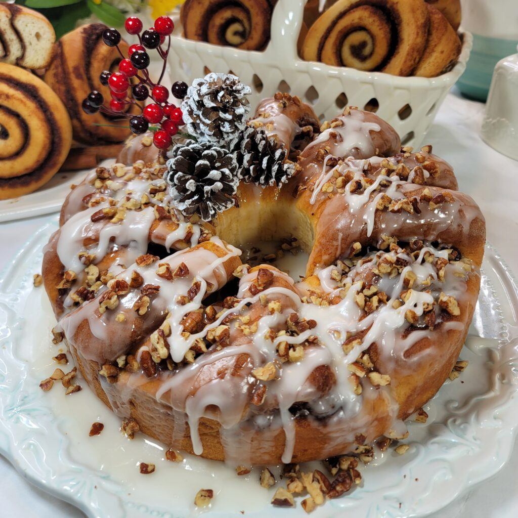 CinnAmazing Tea Ring with Traditional Glaze and Pecans - Cinnamom Bakery