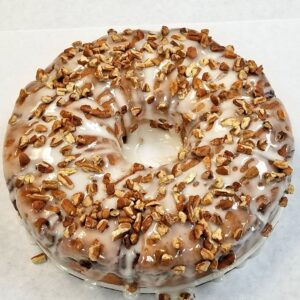 CinnAmazing Tea Ring with Traditional Glaze and Pecans - Cinnamom Bakery
